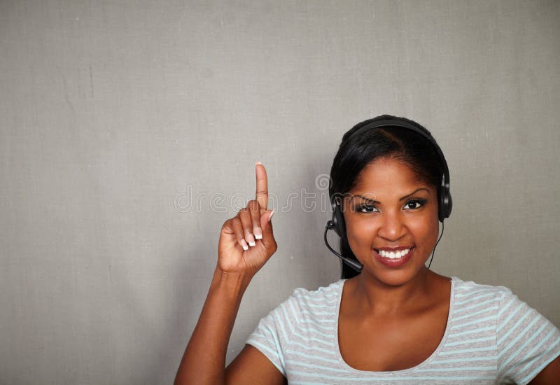 Young Receptionist Girl Talking on Headphones Stock Image - Image of ...