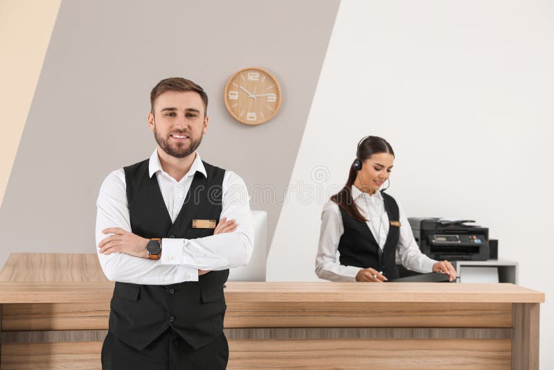 Young Receptionists in Professional Uniform Stock Photo - Image of ...