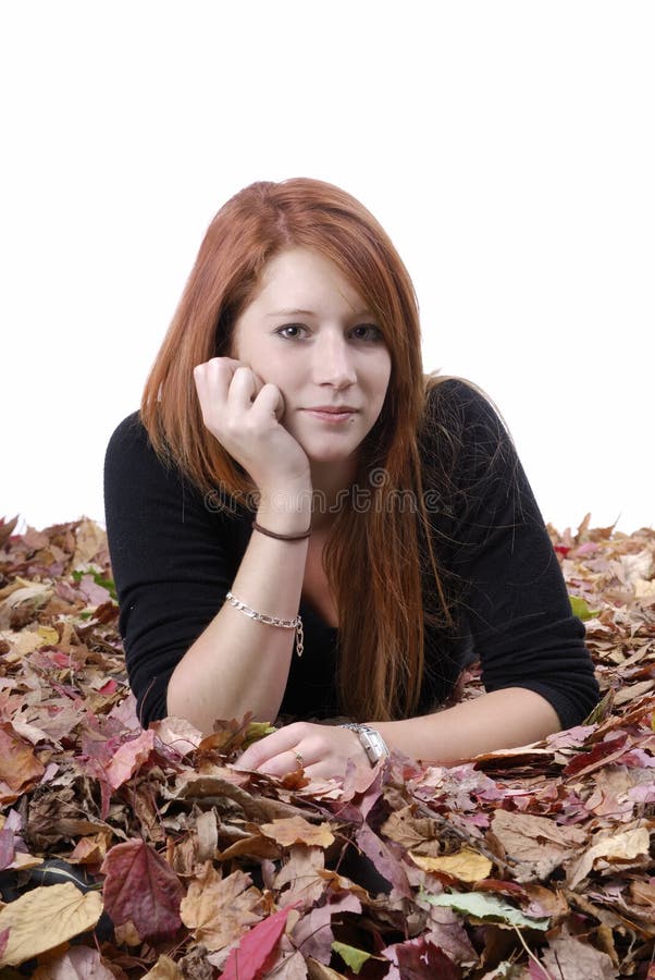 Young Reddish Woman Lying in Autumn Leaves Stock Image - Image of ...