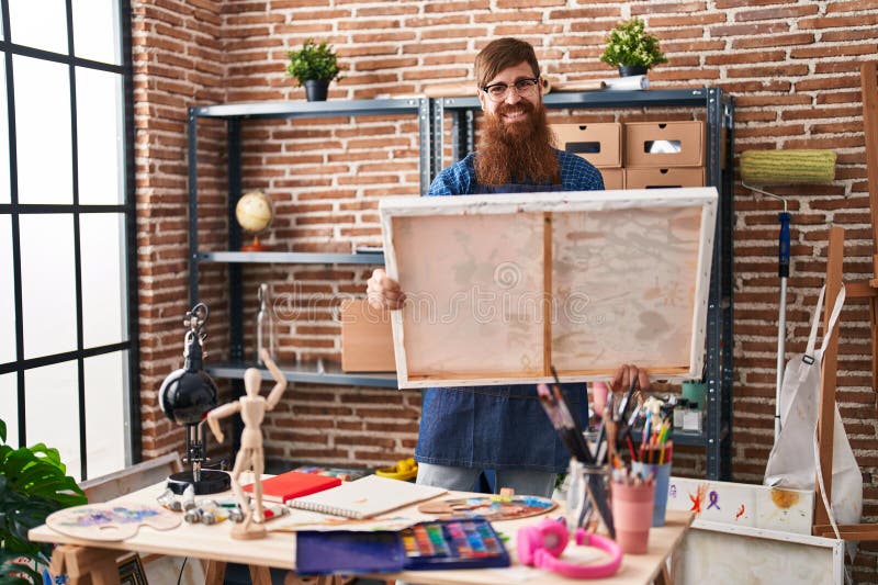 Young Redhead Man Artist Smiling Confident Looking Draw at Art Studio ...