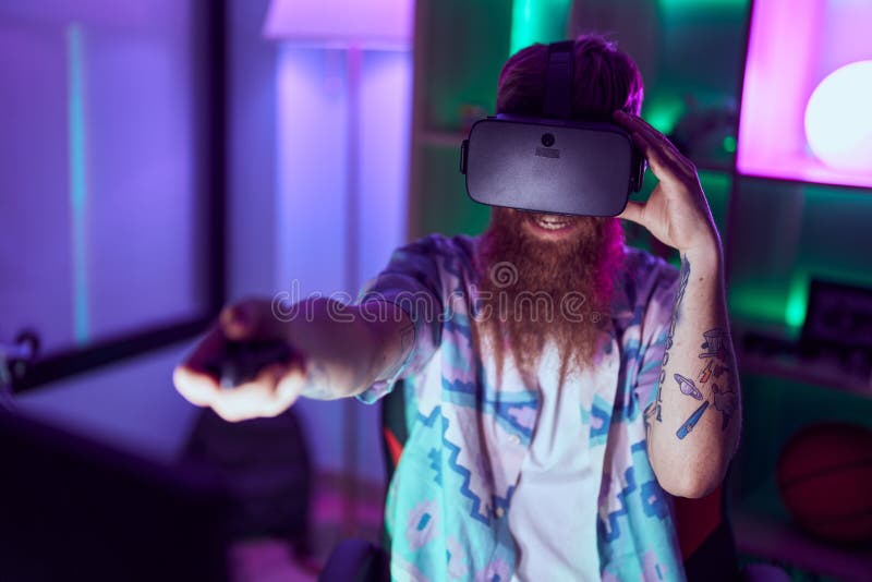 Young Redhead Man Streamer Playing Video Game Using Virtual Reality ...