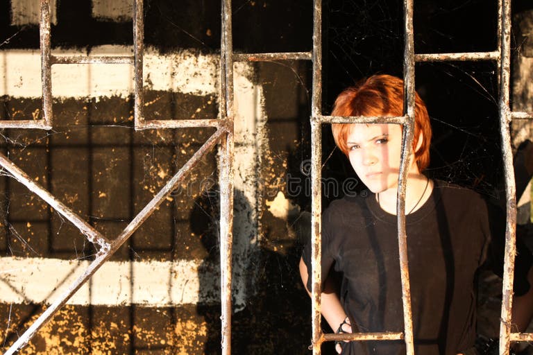 180 Woman Face Behind Bars Stock Photos - Free & Royalty-Free Stock ...