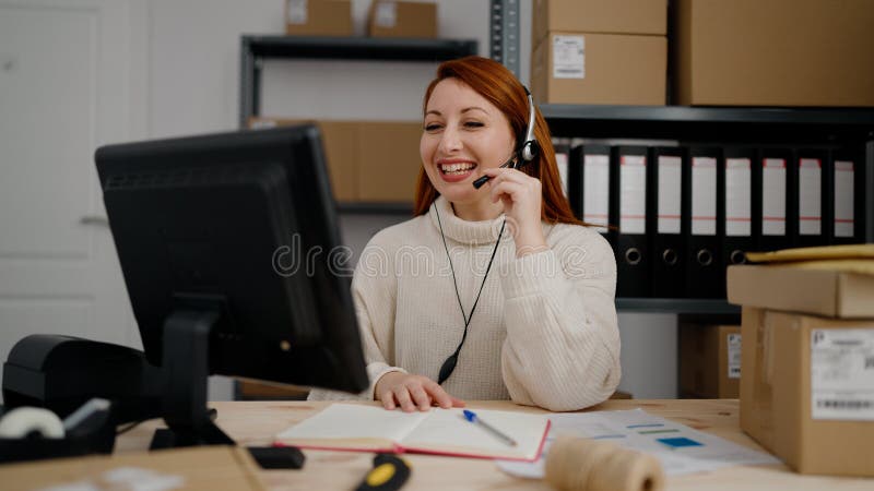 Young Redhead Woman Ecommerce Call Center Agent Having Video Call at ...