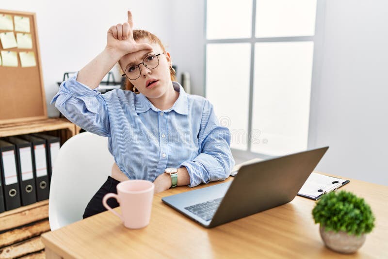 Young Redhead Woman Working at the Office Using Computer Laptop Making ...