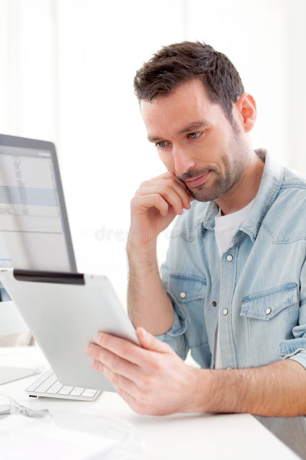 Young Relaxed Man Using Tablet at Home Stock Image - Image of mail ...