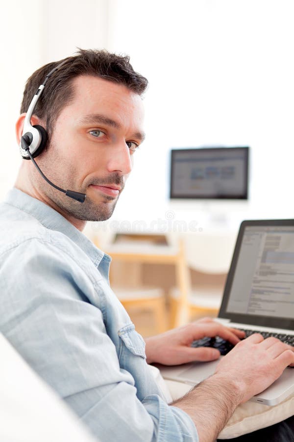 Young Relaxed Man Video-calling on Internet Stock Photo - Image of ...