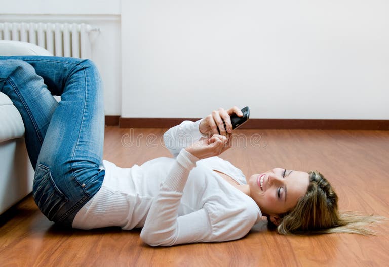Young Relaxed Woman on Mobile Stock Image - Image of phone, alone: 12642175