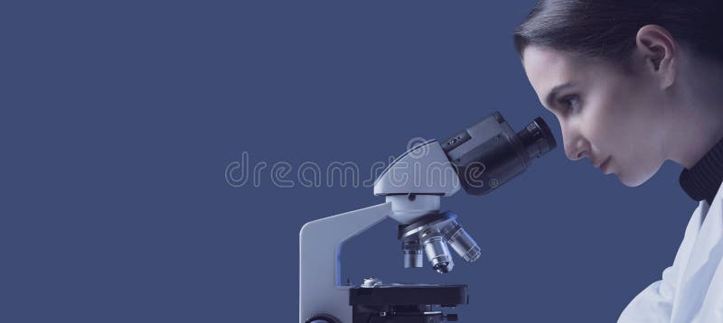 Young Researcher Using a Microscope Stock Photo - Image of professional ...