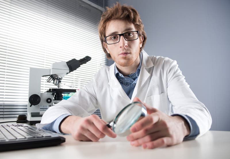 Chemical Laboratory Technician Holding Magnifier Stock Photos - Free ...