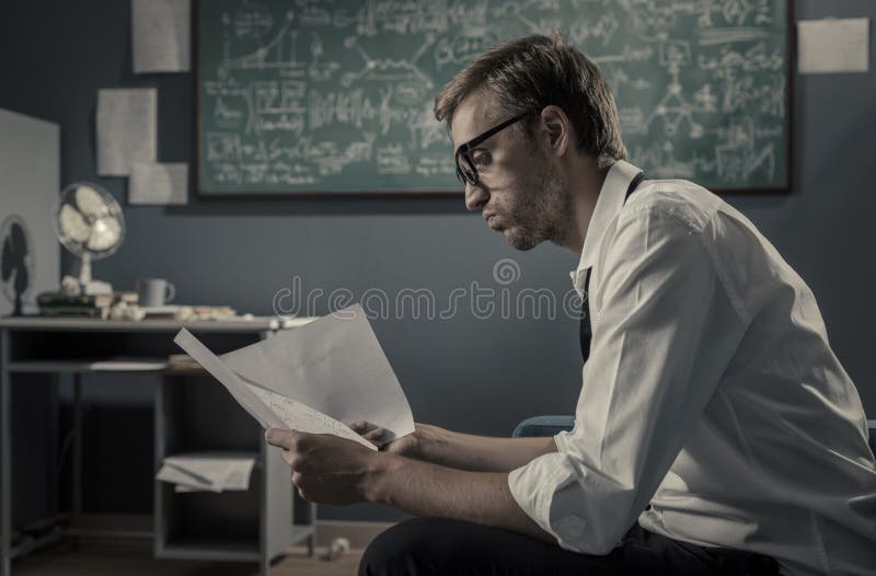 Young Researcher Studying Mathematics in His Office Stock Image - Image ...