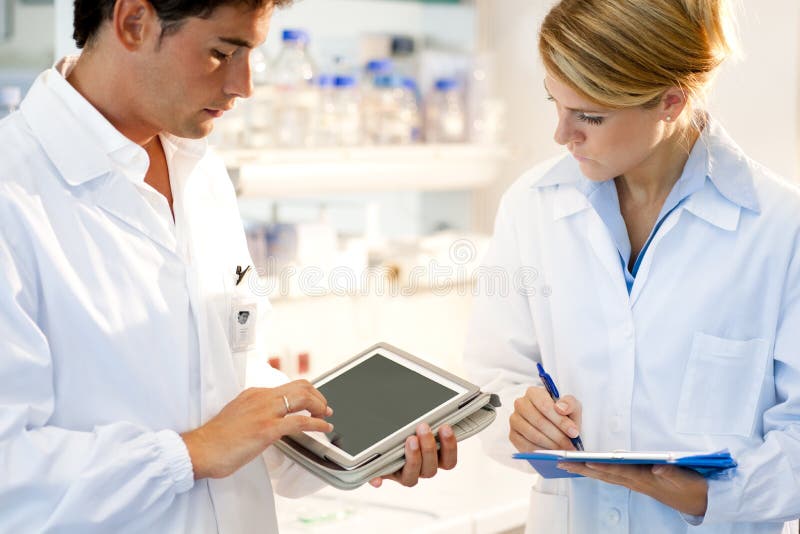 Young Researcher Using Tablet PC Stock Photo - Image of focus, data ...