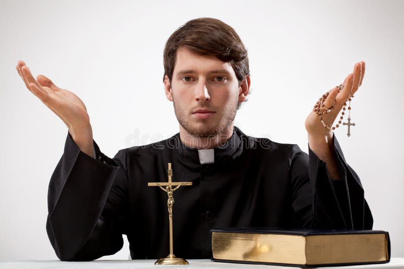 Young Reverend with Rosary and the Bible Stock Image - Image of ...