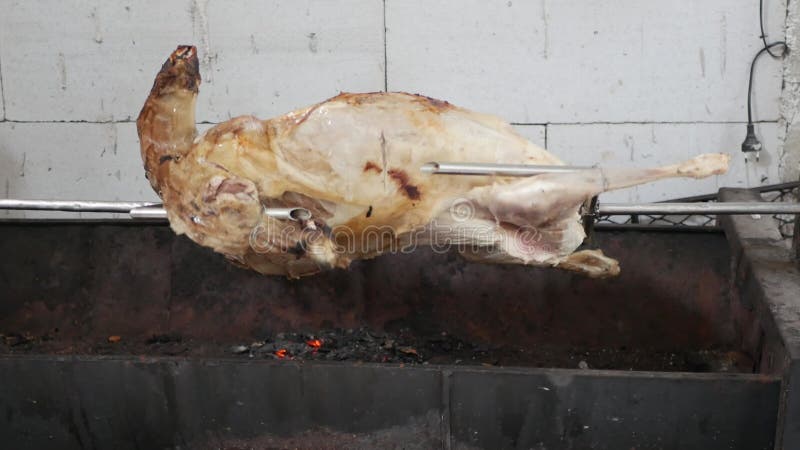 Young Roast Goat with Automatic Rotating Machine Stock Footage - Video ...