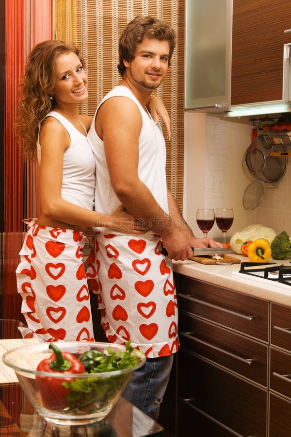 Young Romantic Couple in the Kitchen Stock Image - Image of interior ...