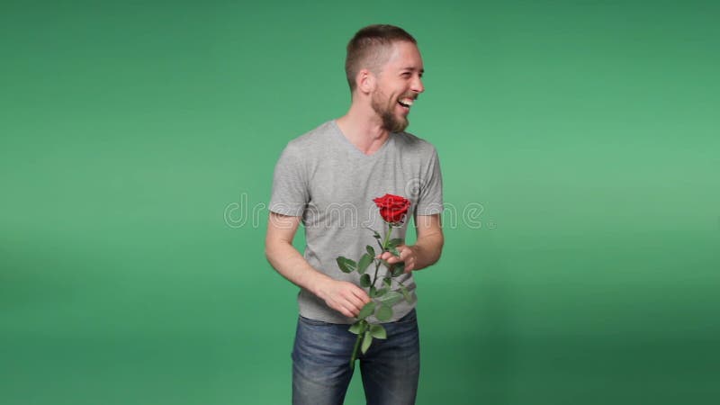Young Romantic Man with a Red Rose Stock Video - Video of handsome ...