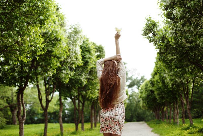 Young Romantic Woman Dancing with Flowers Stock Photo - Image of ...