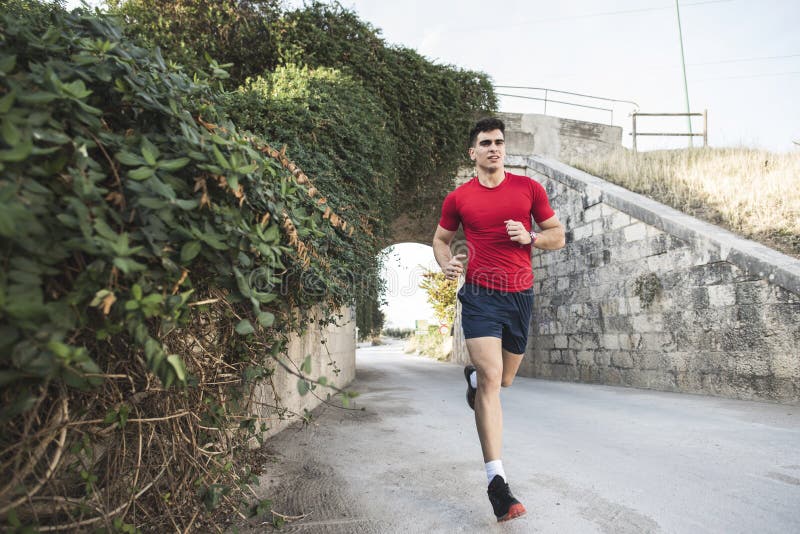 Young Runner Training Outdoors Stock Photo - Image of runner, outdoors ...