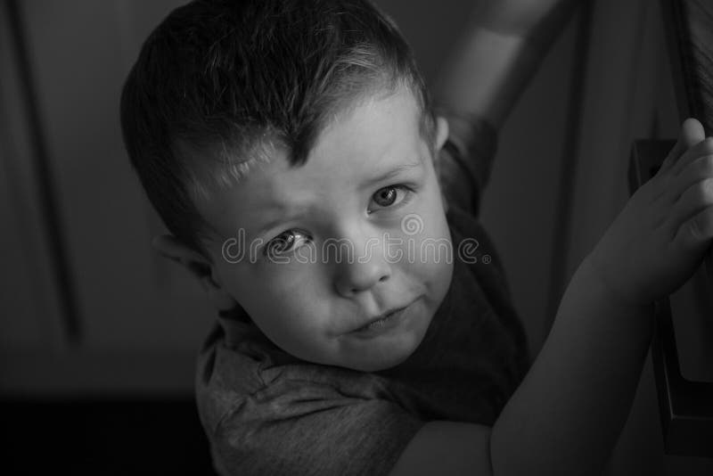 Young sad boy looking up stock image. Image of young - 92270185