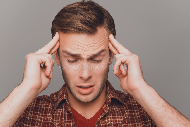 Young Sad Businessman with Big Problems Touching His Head Stock Image ...