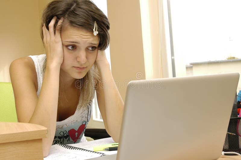 Young Sad Girl with Computer Stock Photo - Image of mood, unhappy: 11016560