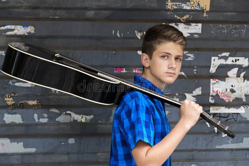 Young Sad Guy with an Guitar Stock Photo - Image of hand, nature: 96942418