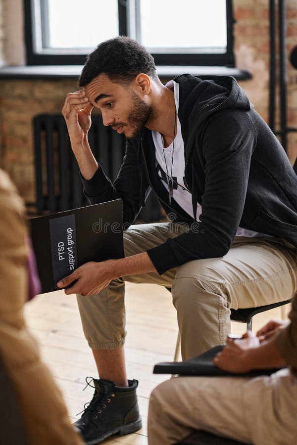 Young Sad Man with Post Traumatic Syndrome Attending Support Group ...