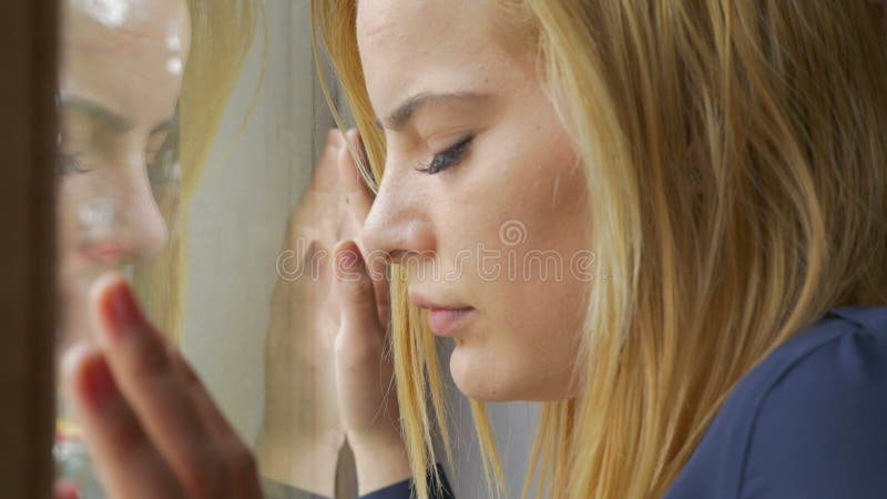 Young Attractive Bored Woman Waiting and Looking Out the Window Stock ...