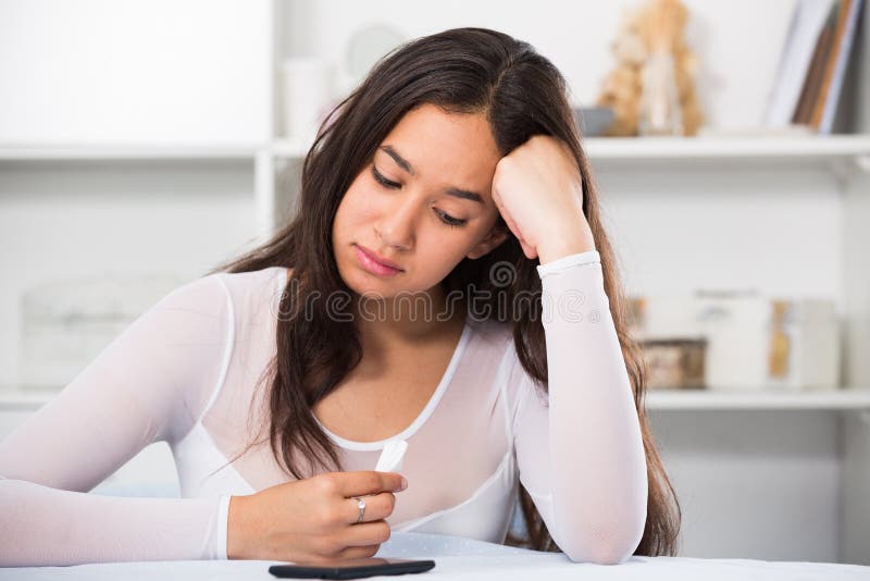 Young Sad Woman Sitting at the Table Stock Photo - Image of adult, cozy ...
