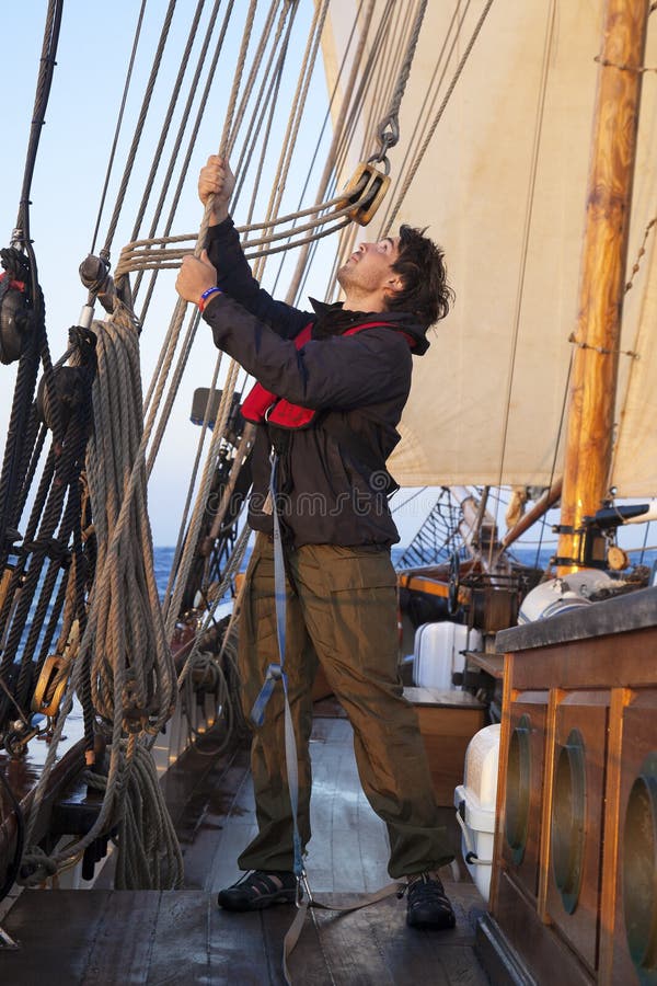 Young sailor at work stock image. Image of ship, rope - 47092685