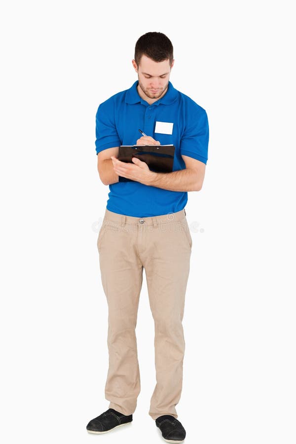 Young Salesman in Suit Pointing Signature Space with Pencil Offering ...