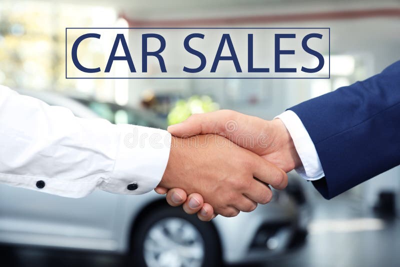 Salesman Shaking Hands with Customer while Giving Car Key in Auto ... Salesman Shaking Hands with Customer while Giving Car Key in Auto ...