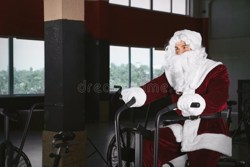 Young Santa Claus Training in Gym Stock Photo - Image of sale, indoors ...
