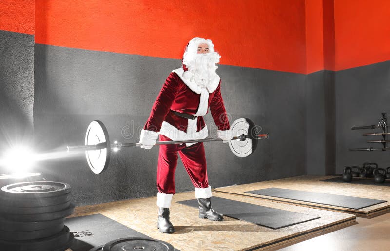 Young Santa Claus Training in Gym Stock Photo - Image of indoors ...