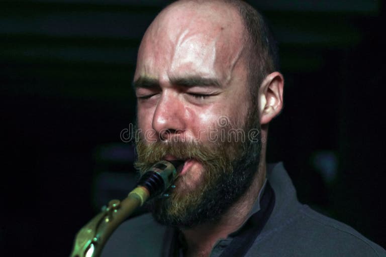 Young saxophone player stock photo. Image of musician - 89496552