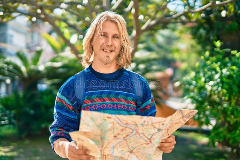 Young Scandinavian Tourist Man Smiling Happy Using Map at the Park ...