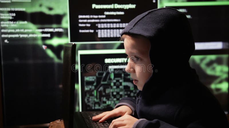 Young Schoolboy Prodigy - a Hacker. Hacker at Work. Lots of Digits on ...