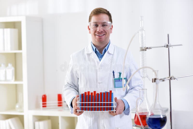 Young Science Holding Tubes at Professional Lab Stock Image - Image of ...