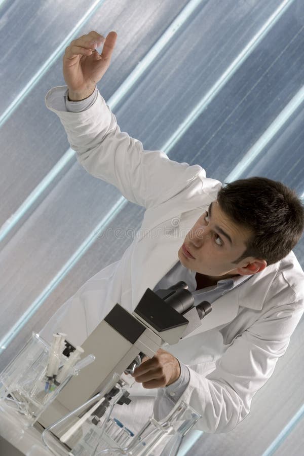 Young Scientist Consulting His Colleagues Stock Photo - Image of ...