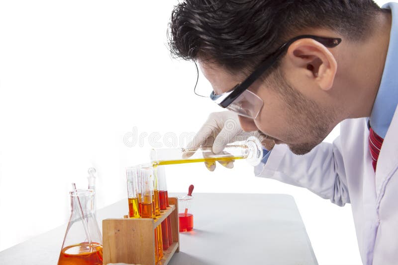 Young Scientist Mixing Chemical Liquid For Experiment Stock Image ...