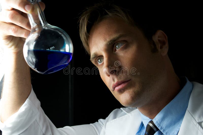 Young Scientist Performing Experiment Stock Image - Image of beaker ...