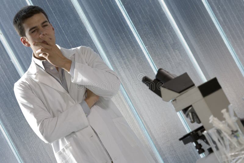 Young Scientist Thinking in His Lab Stock Photo - Image of biological ...