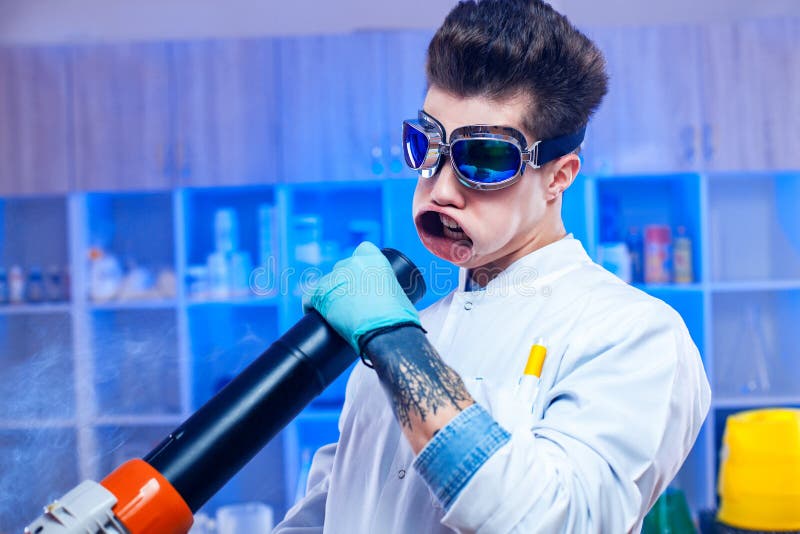 Scientist Blowing To Face in Lab Stock Photo - Image of science, mouth ...