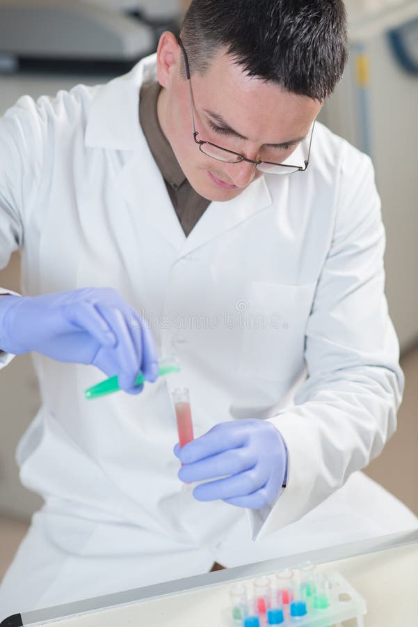 Young Scientist Working with Liquid Materials Stock Image - Image of ...