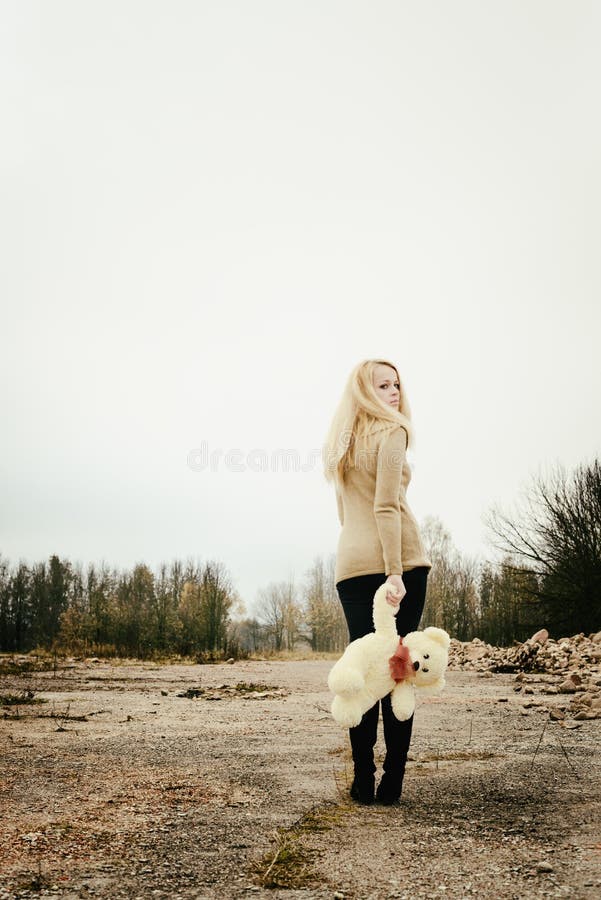 Young Sensual Girl Blonde in Windy Fall with Toy Stock Image - Image of ...