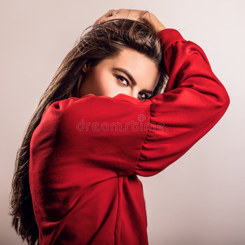 Young Sensual Model Woman in Red Pose in Studio. Stock Image - Image of ...