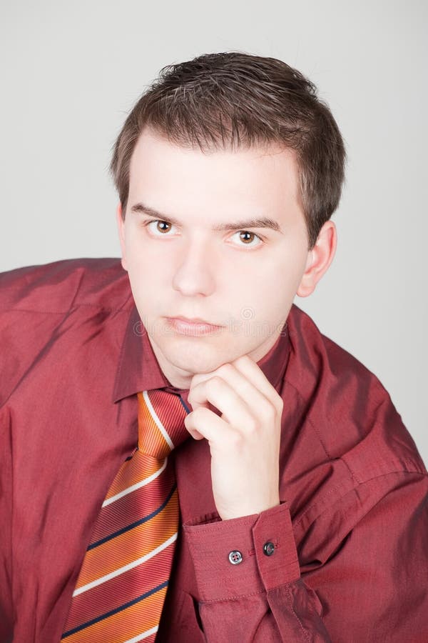 Young serious man stock image. Image of cool, thinking - 14994571