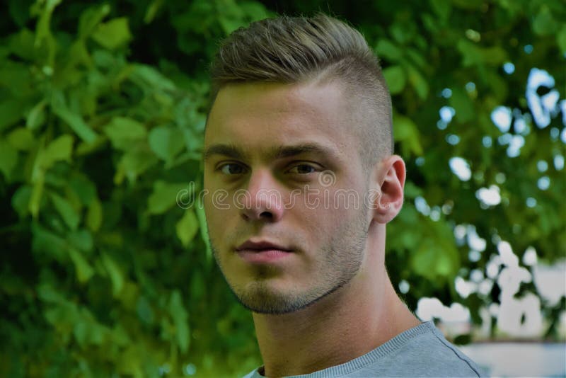 Young Serious Man in the Park Stock Photo - Image of person, male ...