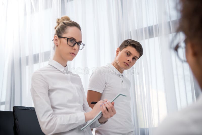 Young Serious Students with Exercise Stock Image - Image of study, male ...