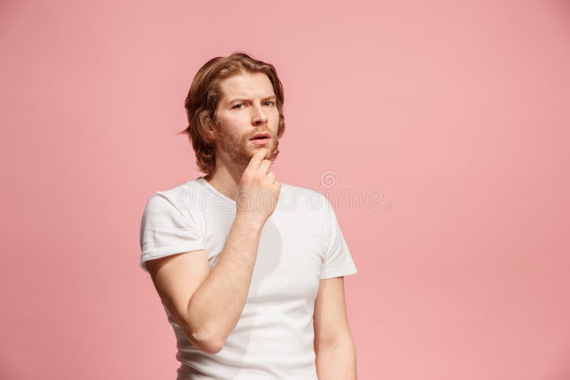 Young Serious Thoughtful Business Man. Doubt Concept. Stock Photo ...