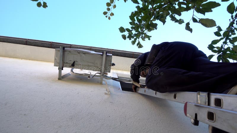 Young Serious Worker Sets Split System Air Conditioner Outdoor Stock ...